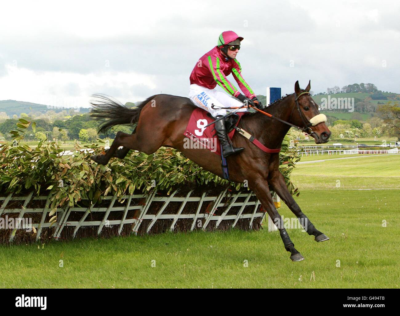 Jockey C Murphy on Let the Show Begin jumps during the Avon Ri ...