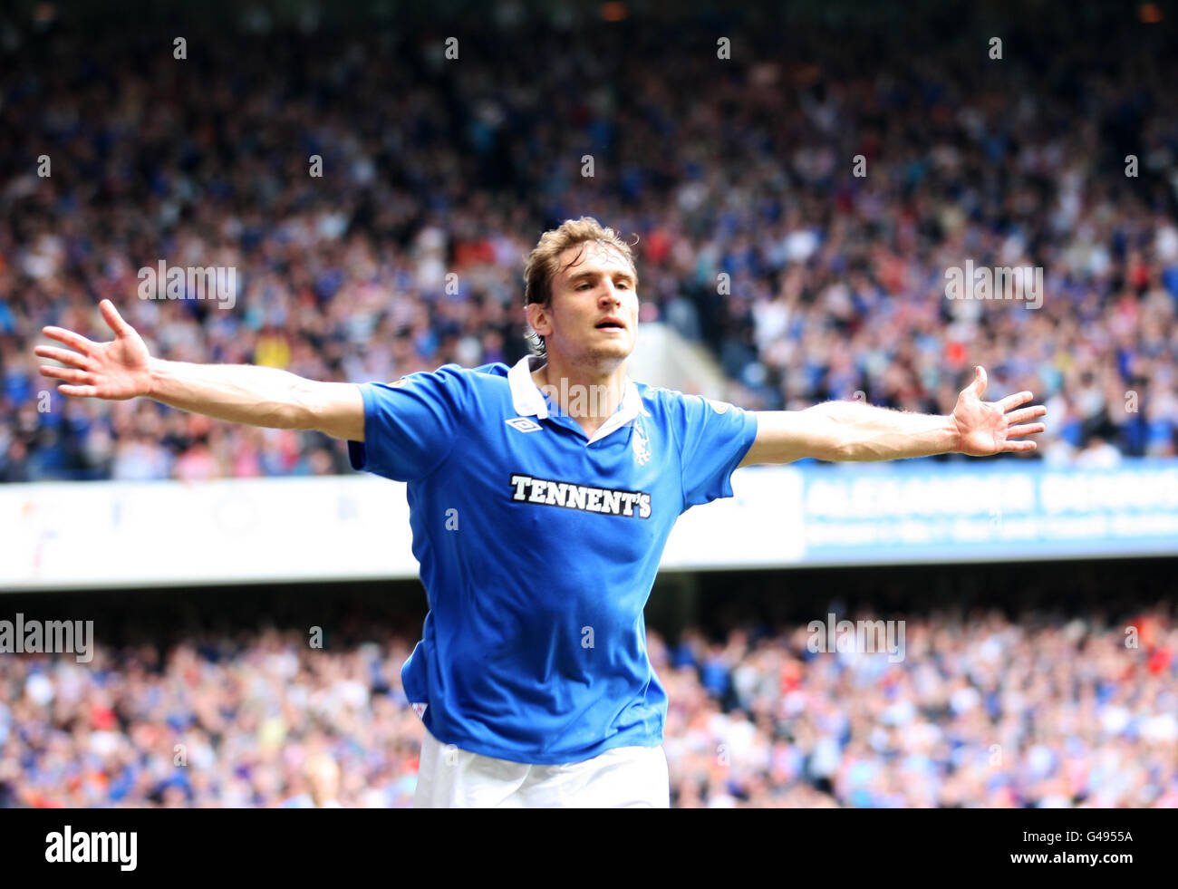 Rangers' Nickia Jelavic celebrates scoring the opening goal during the ...
