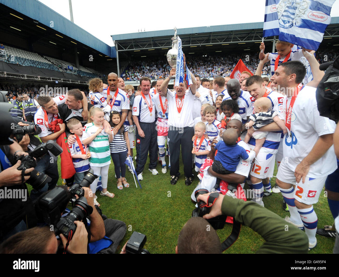 QPR players celebrate after receiving the Championship Trophy following ...