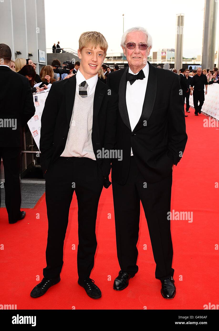 Barry Norman and grandson Harry arriving for the 2011 National Movie ...