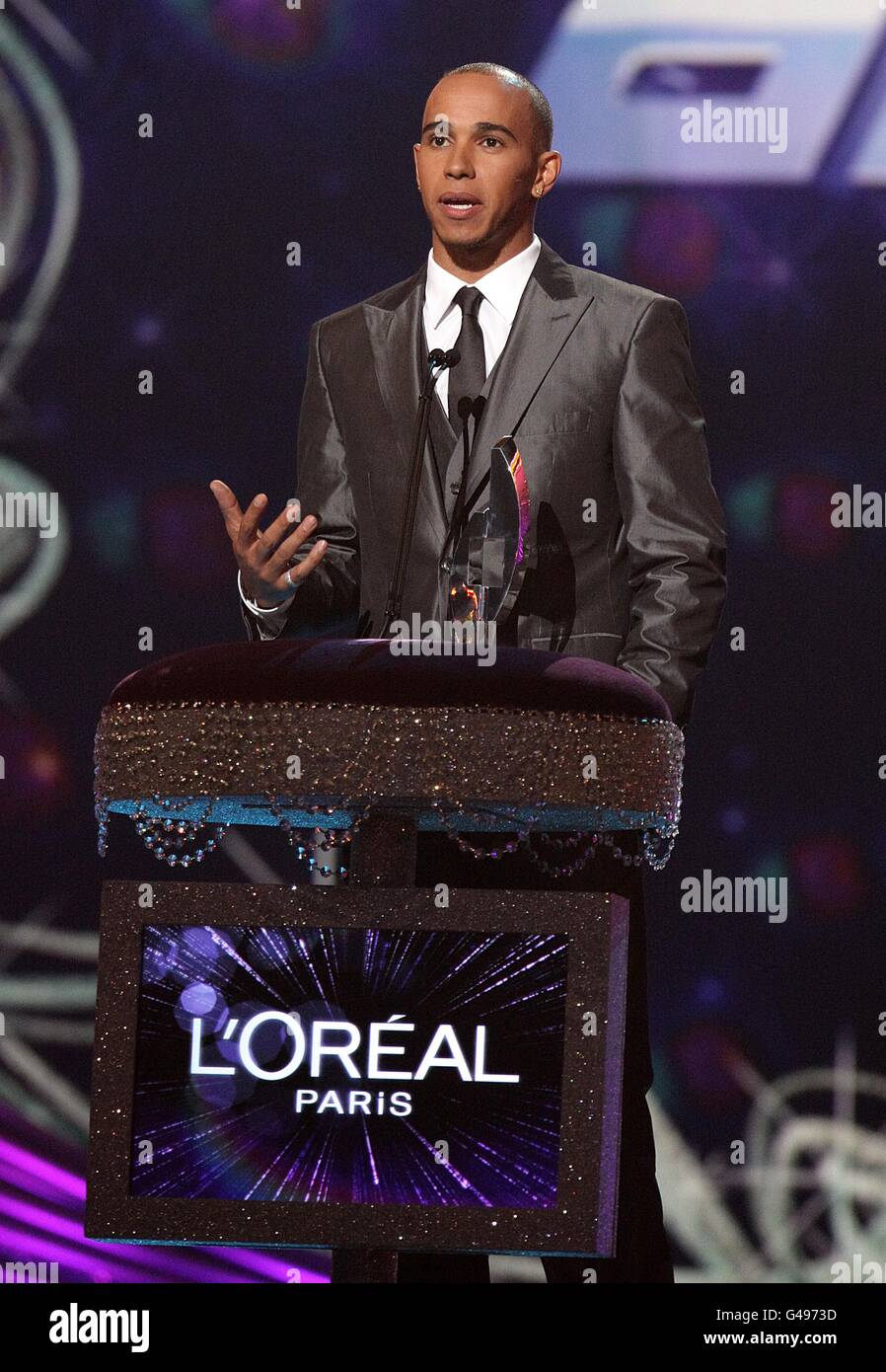 Lewis Hamilton presents the award for best Animation on stage during ...