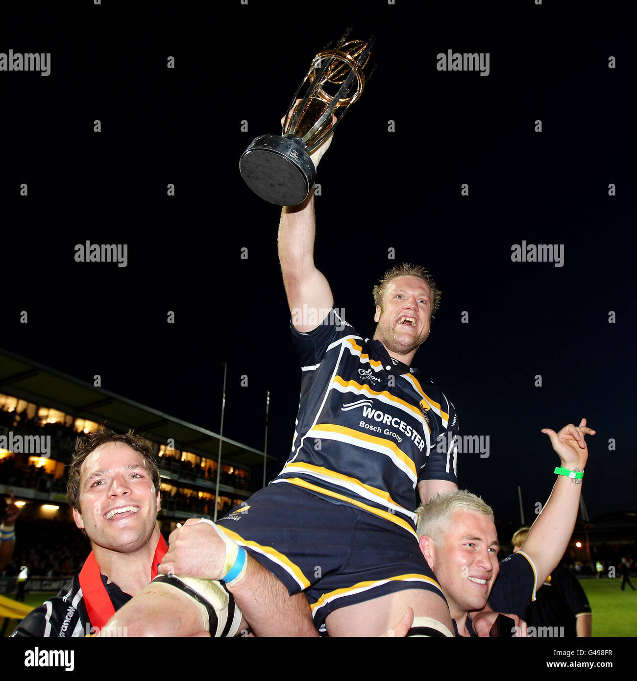 Worcester's Greg Rawlinson celebrates with the trophy after victory ...