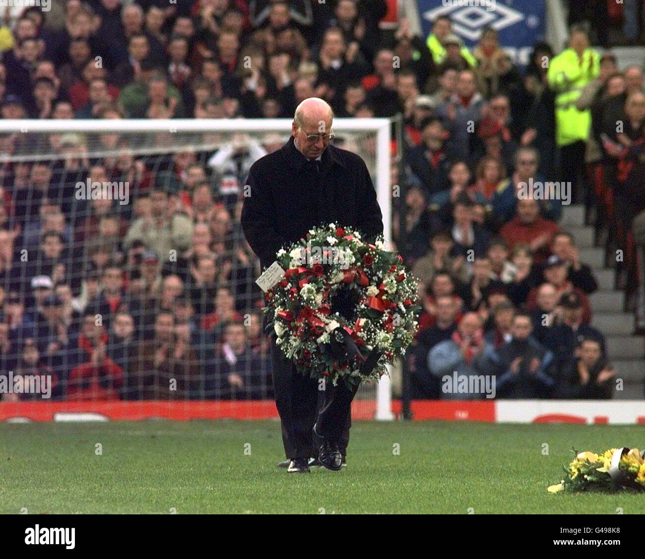 Sir Bobby Charlton lays a wreath to mark the 40th Anniversary of the ...