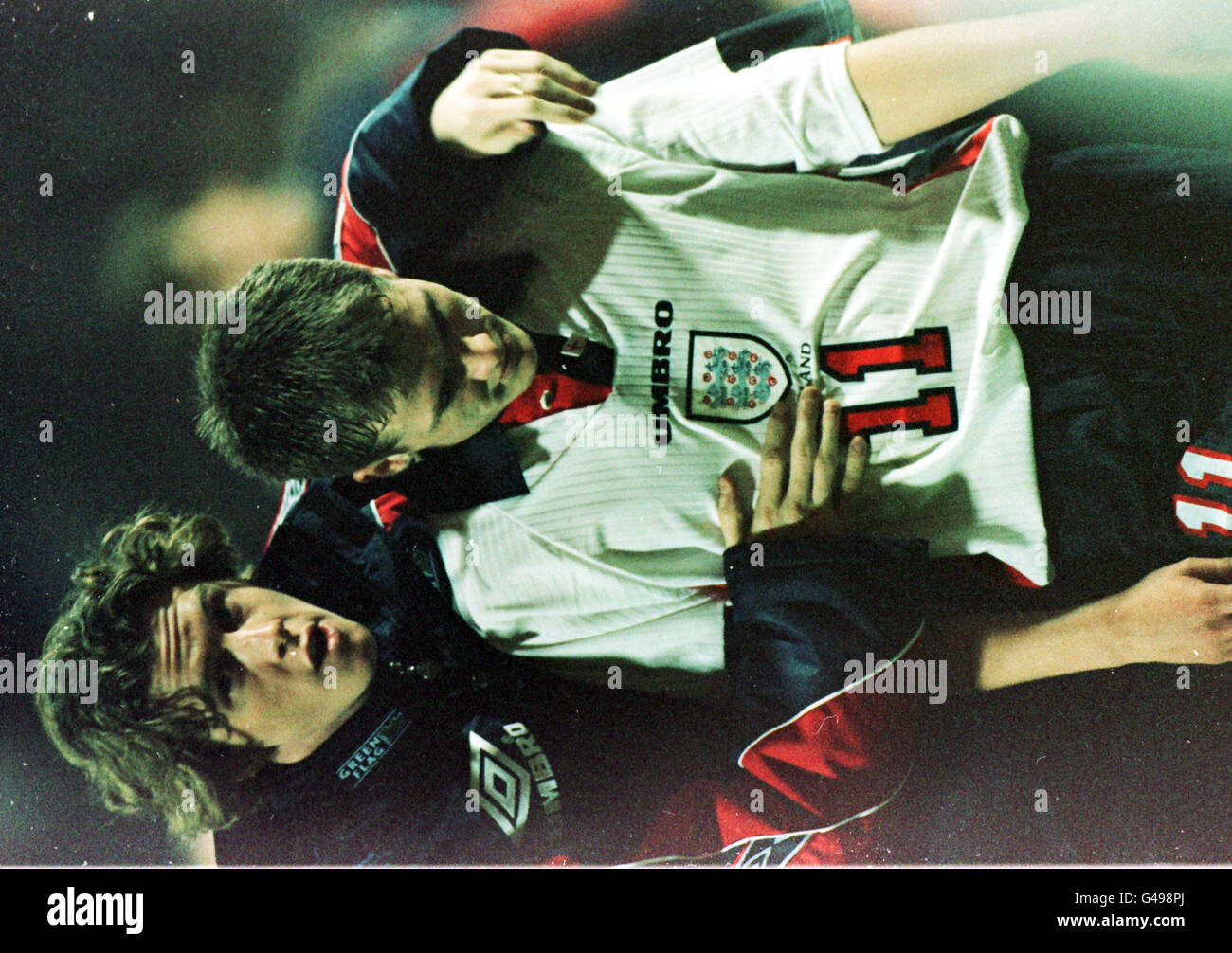 Steve Macmanaman consoles Michael Owen after England lost 0-2 against ...