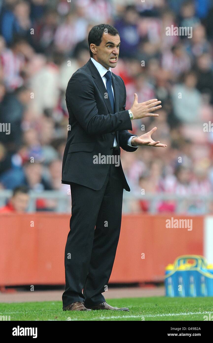 Wigan athletic manager roberto martinez reacts on the touchline hi-res ...