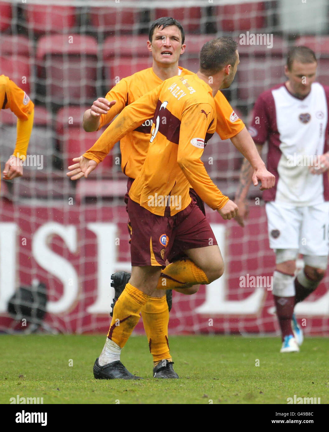 Motherwell's Tom Hateley (front) celebrates his teams second goal with ...