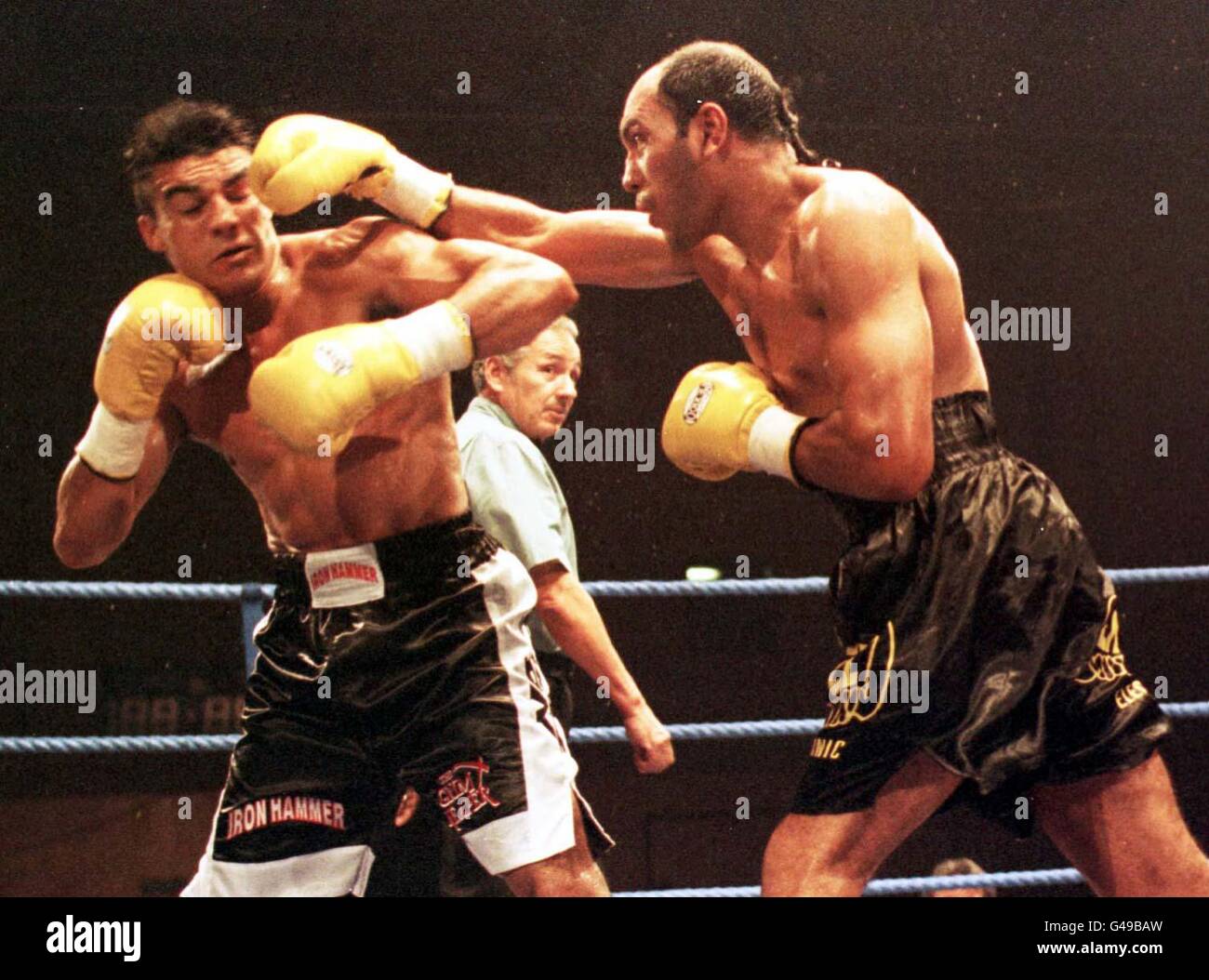 Britain's Robin Reid takes a right to the head during his defence of ...