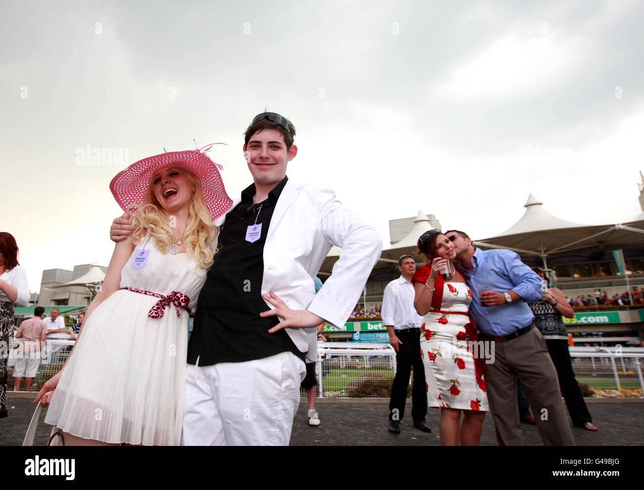 Racegoers enjoy themselves at the end of the days racing hi-res stock ...