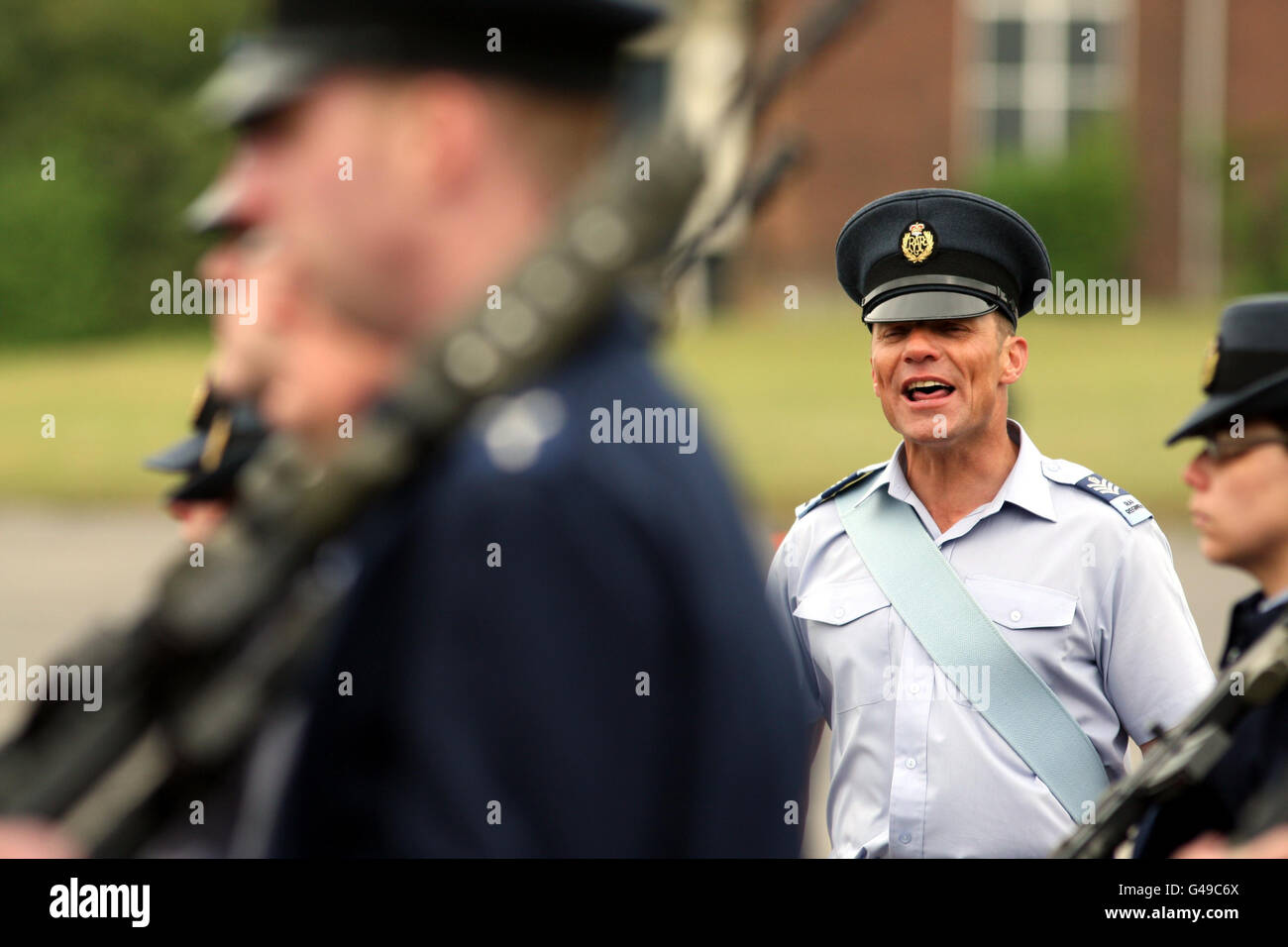 Flight Sergeant Andrew Henderson of the Queen's Colour Squadron briefs ...
