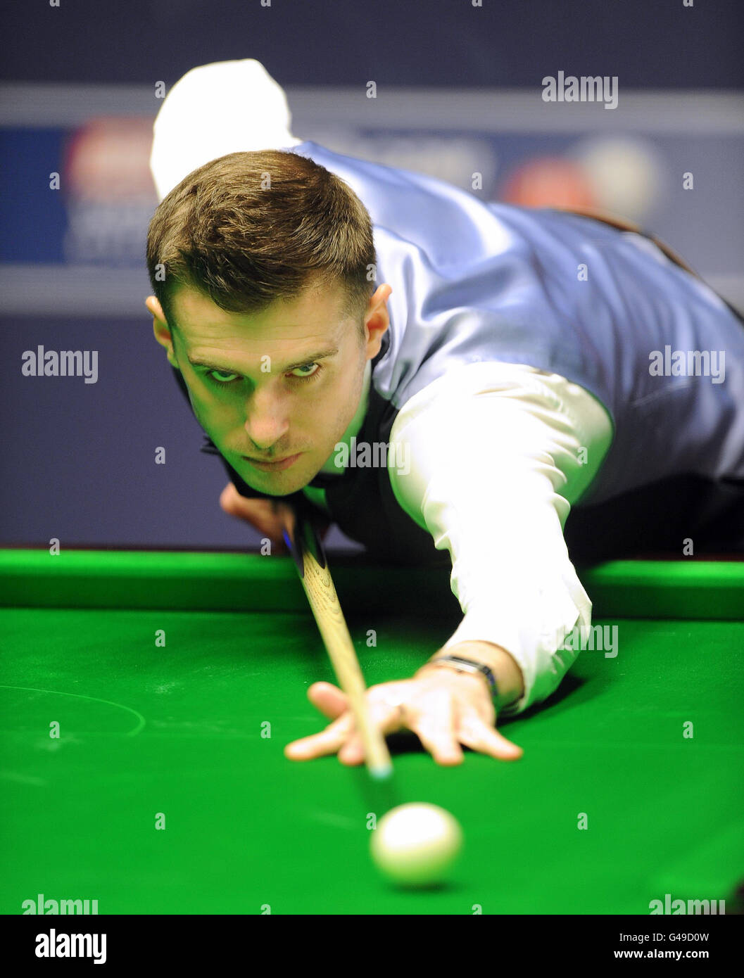 Mark Selby in action against Ding Junhui during their Quarter-final match of the Betfred.com ...
