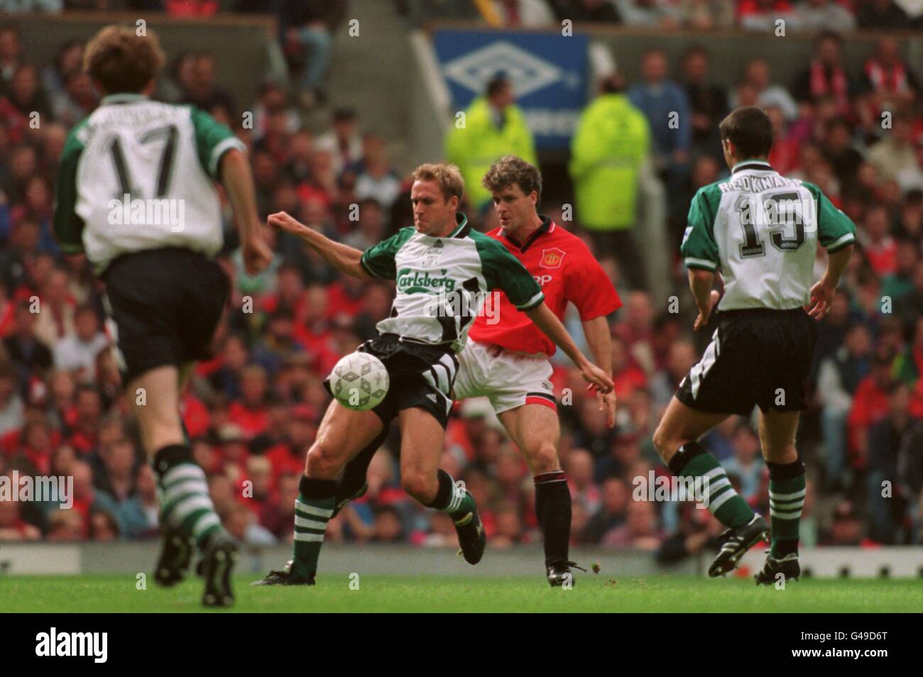 SOCCER. JOHN SCALES, LIVERPOOL, BEATS MARK HUGHES, MANCHESTER UNITED ...