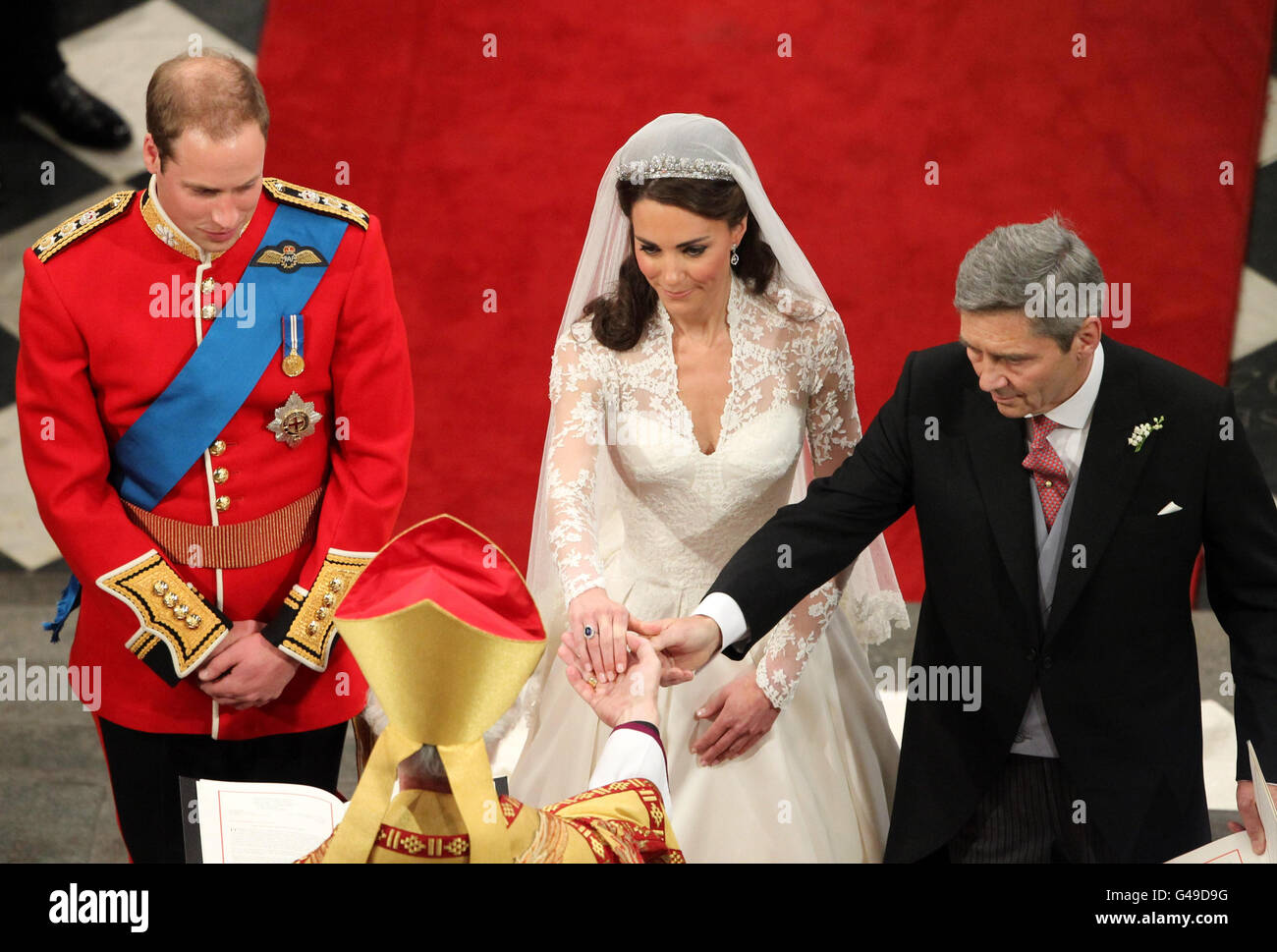 Prince William and Kate Middleton, with her father Michael, at ...