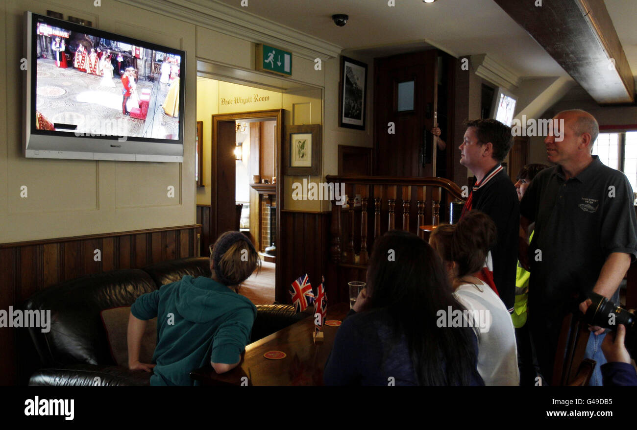 People watch the royal wedding of Prince William and Kate Middleton, on ...