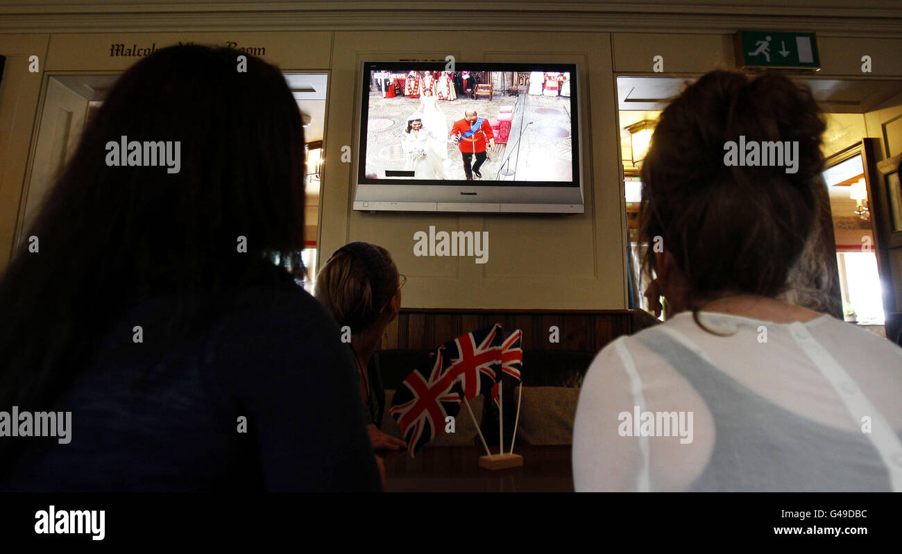 People watch the royal wedding of Prince William and Kate Middleton, on ...