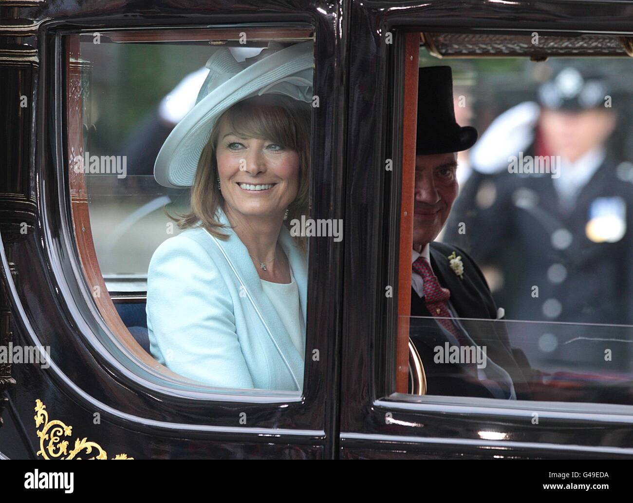 Carole Middleton in the Royal procession as they make their way down ...