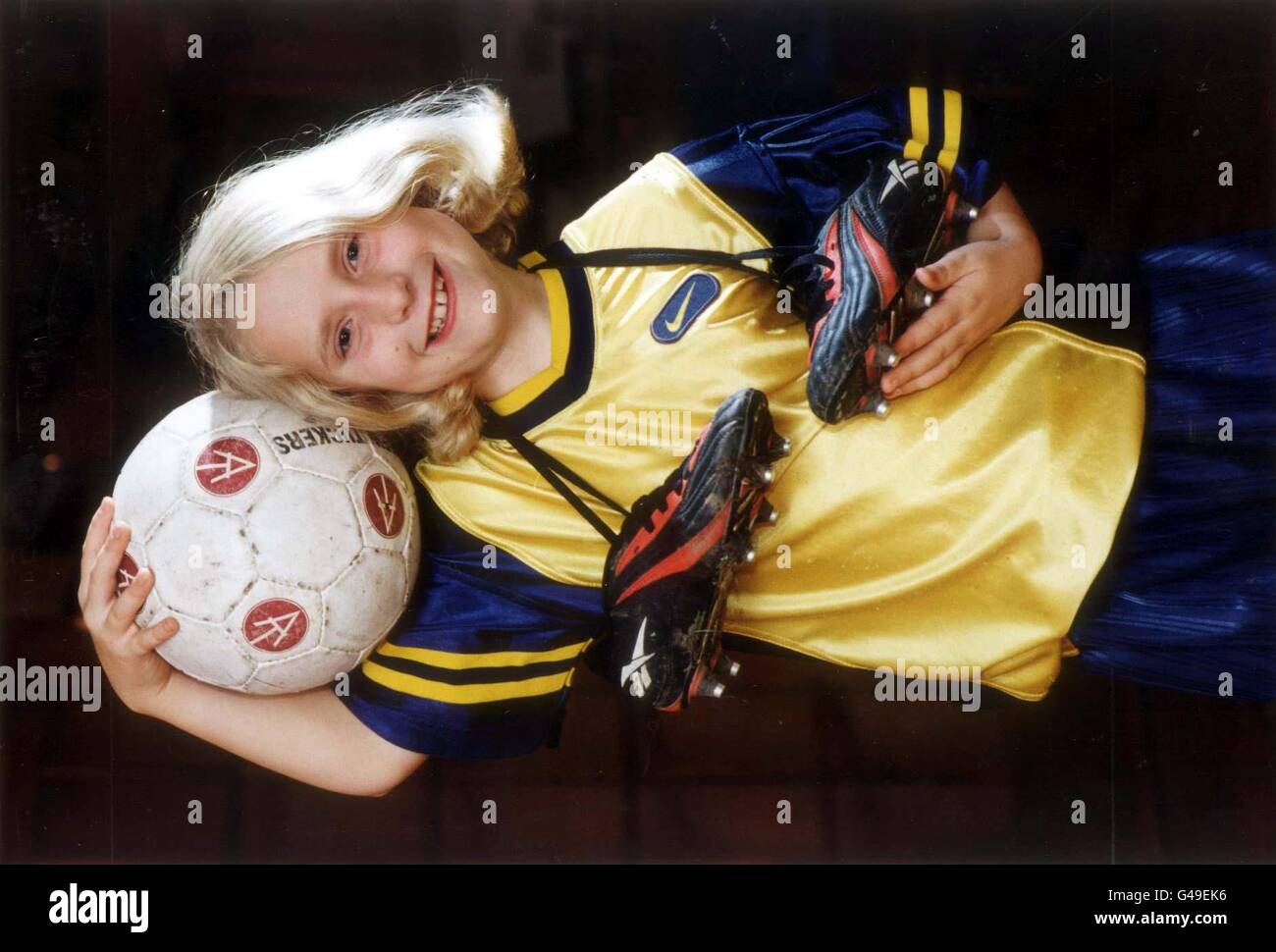 Soccer mad 10-year-old Natalie Holbrook poses in her kit today ...