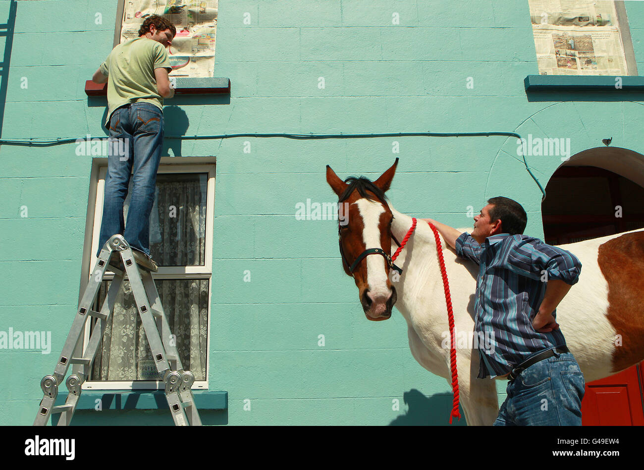 Greg Ryan (left) chats to Micheal Douglas on the main street in ...