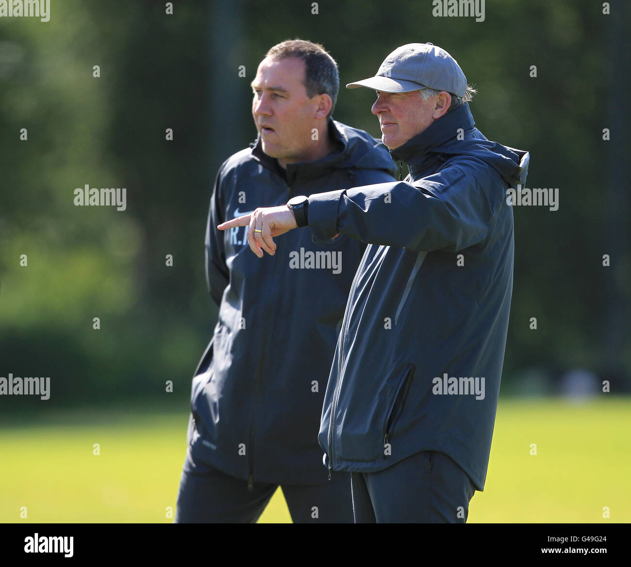 Manchester United's manager Sir Alex Ferguson (right) with first team ...