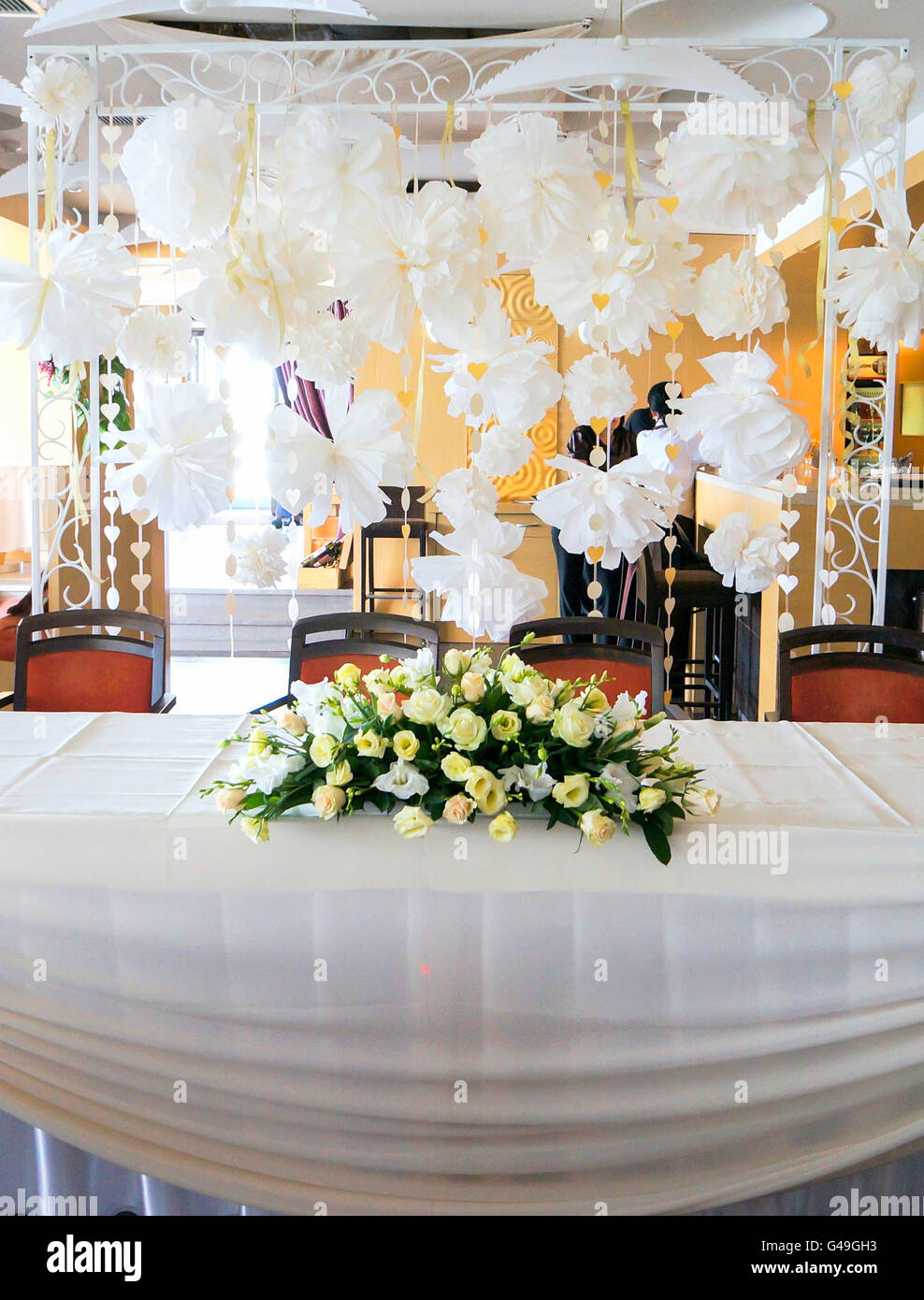 Tables decorated with flowers Stock Photo - Alamy