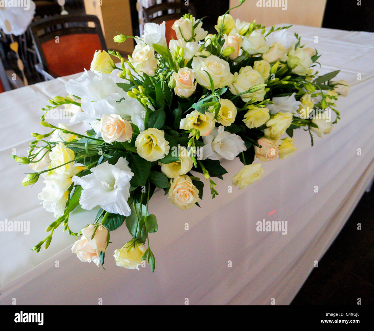 Tables decorated with flowers Stock Photo - Alamy