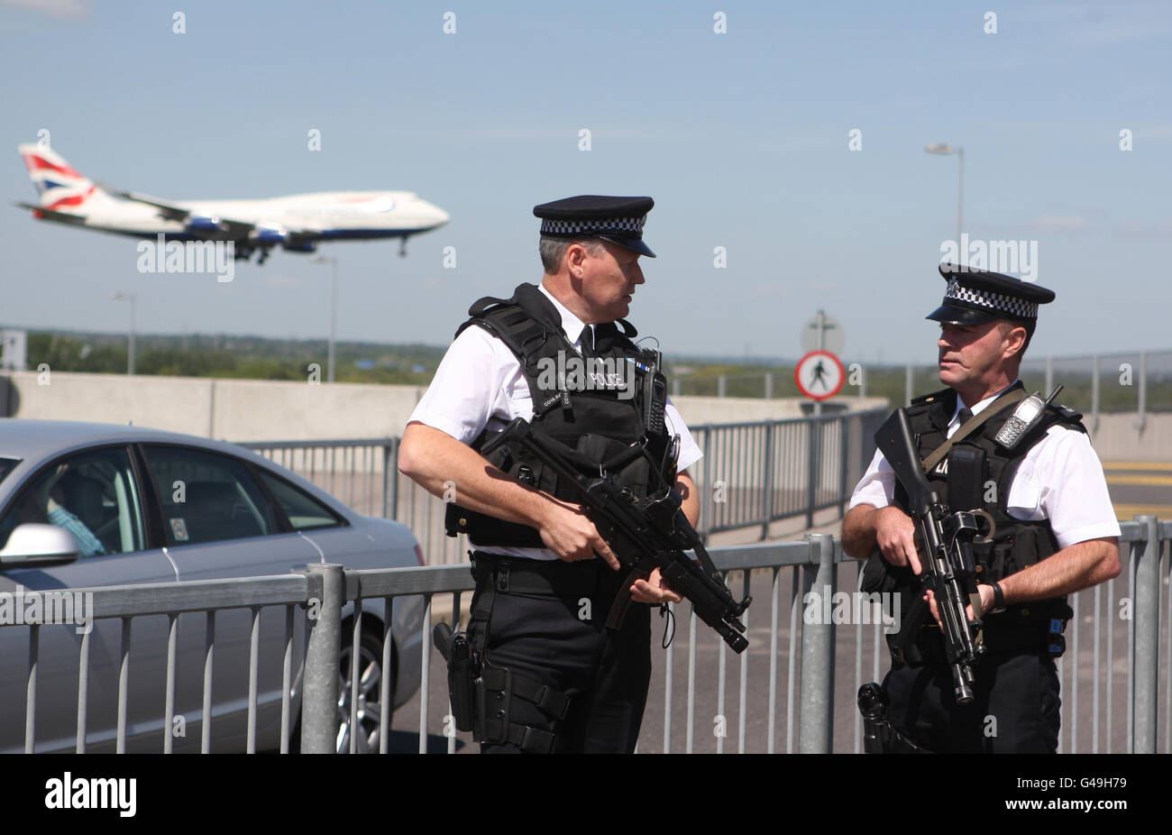 Police officers during routine patrol in terminal of heathrow airport ...