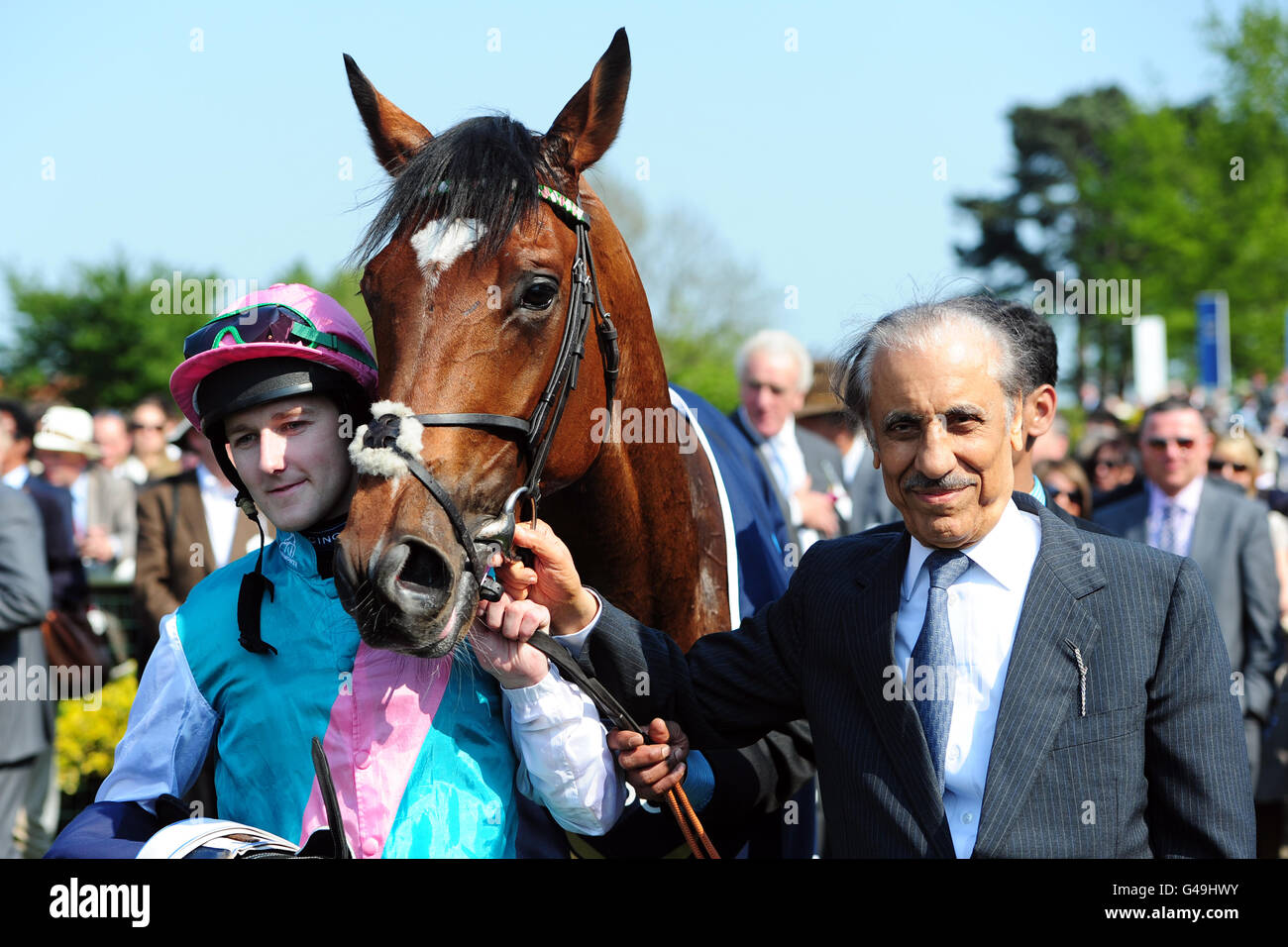 Jockey Tom Queally (left) poses with Frankel (centre) and owner Prince ...