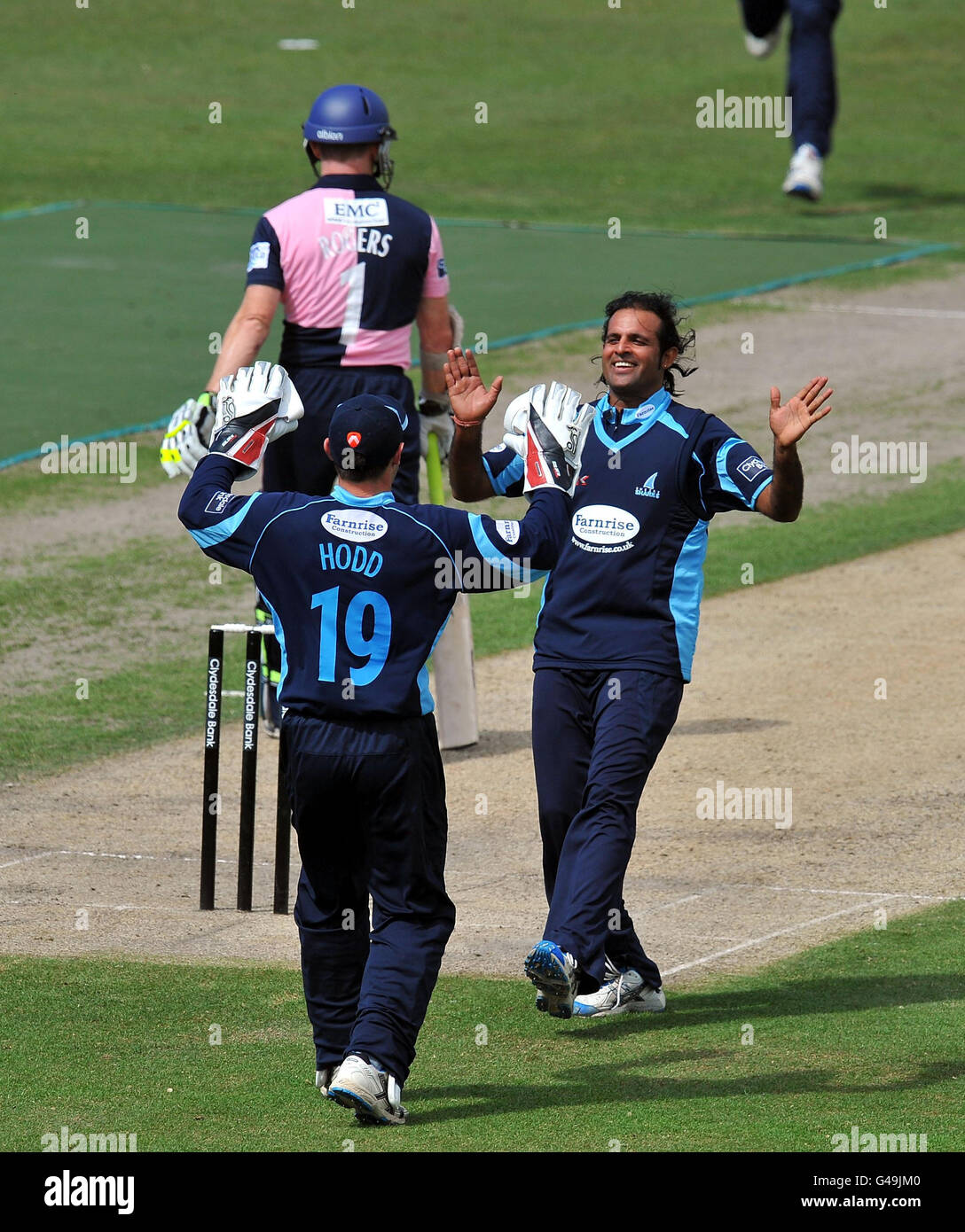 Sussex's Naved-ul-Hasan (right) celebrates with Andrew Hodd (left ...