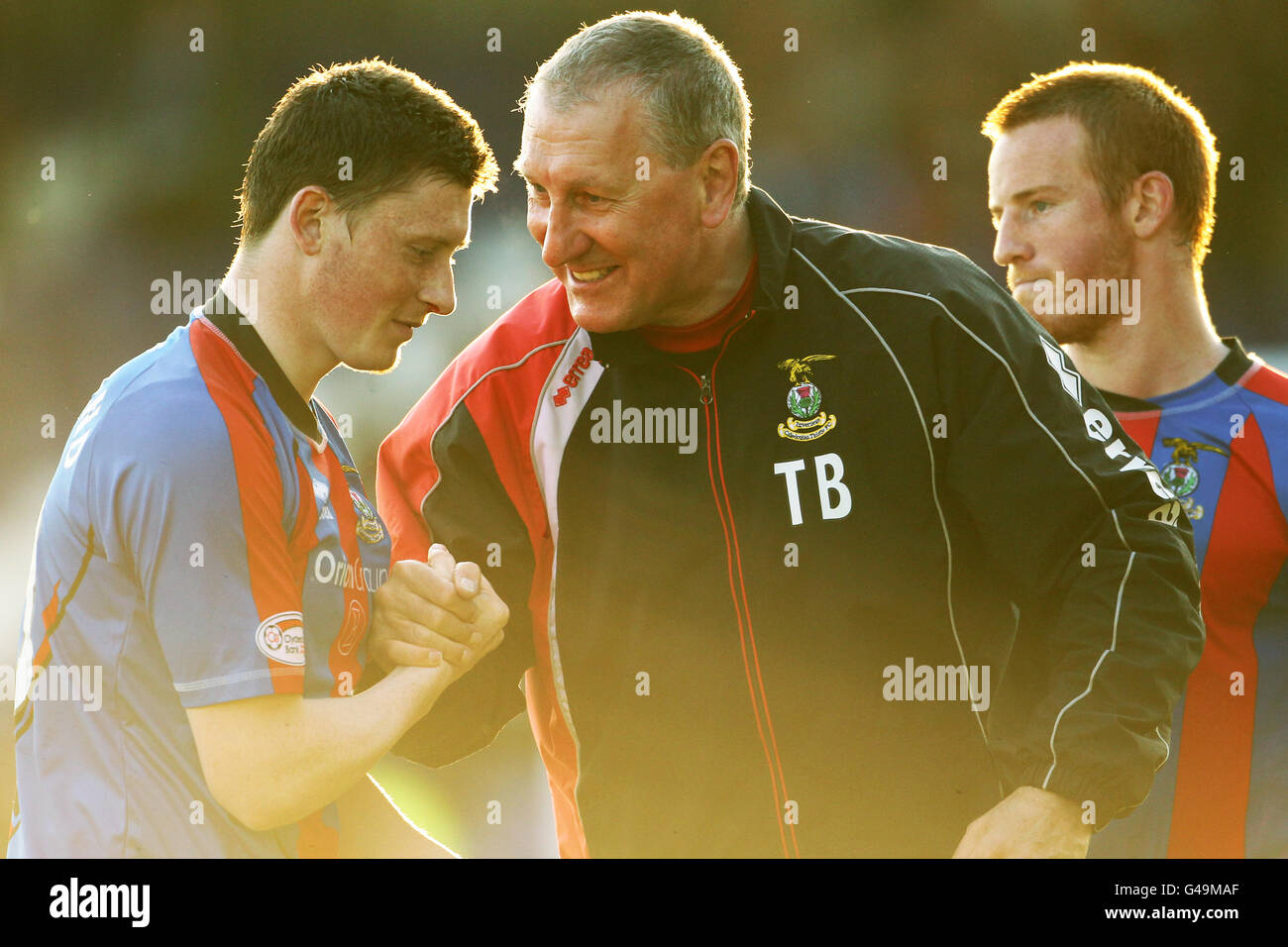 Shane Sutherland and Inverness Caledonian Thistle Manager Terry Butcher ...