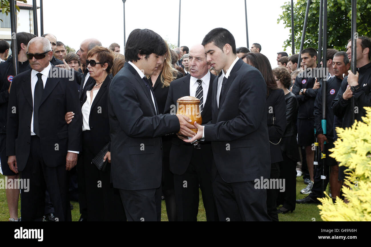 Javier Ballesteros (left) and Miquel Ballesteros (right) hold the urn ...