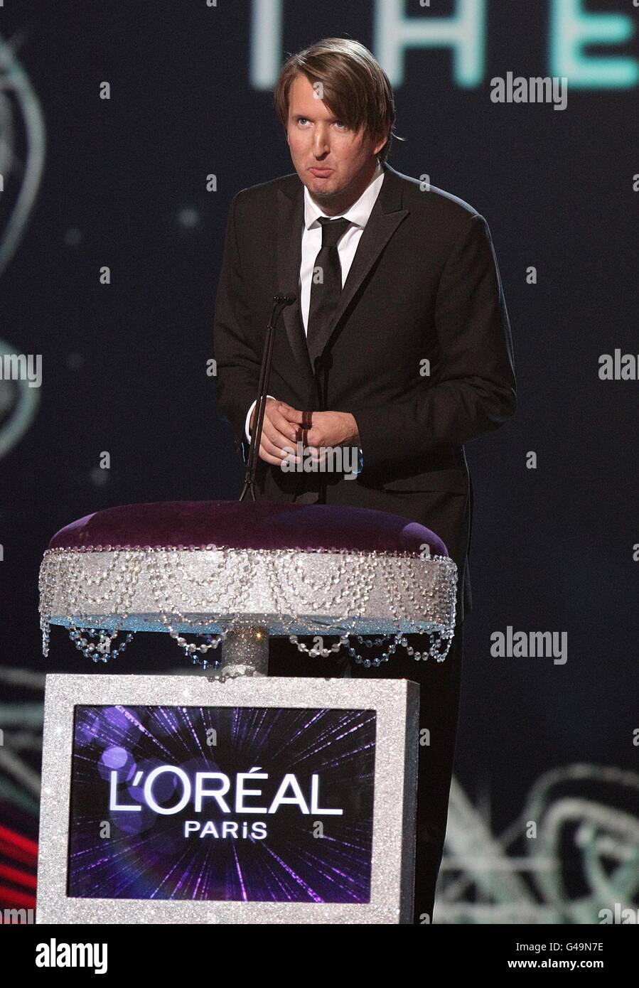 Director Tom Hooper accepts the award for Best Drama on stage during ...