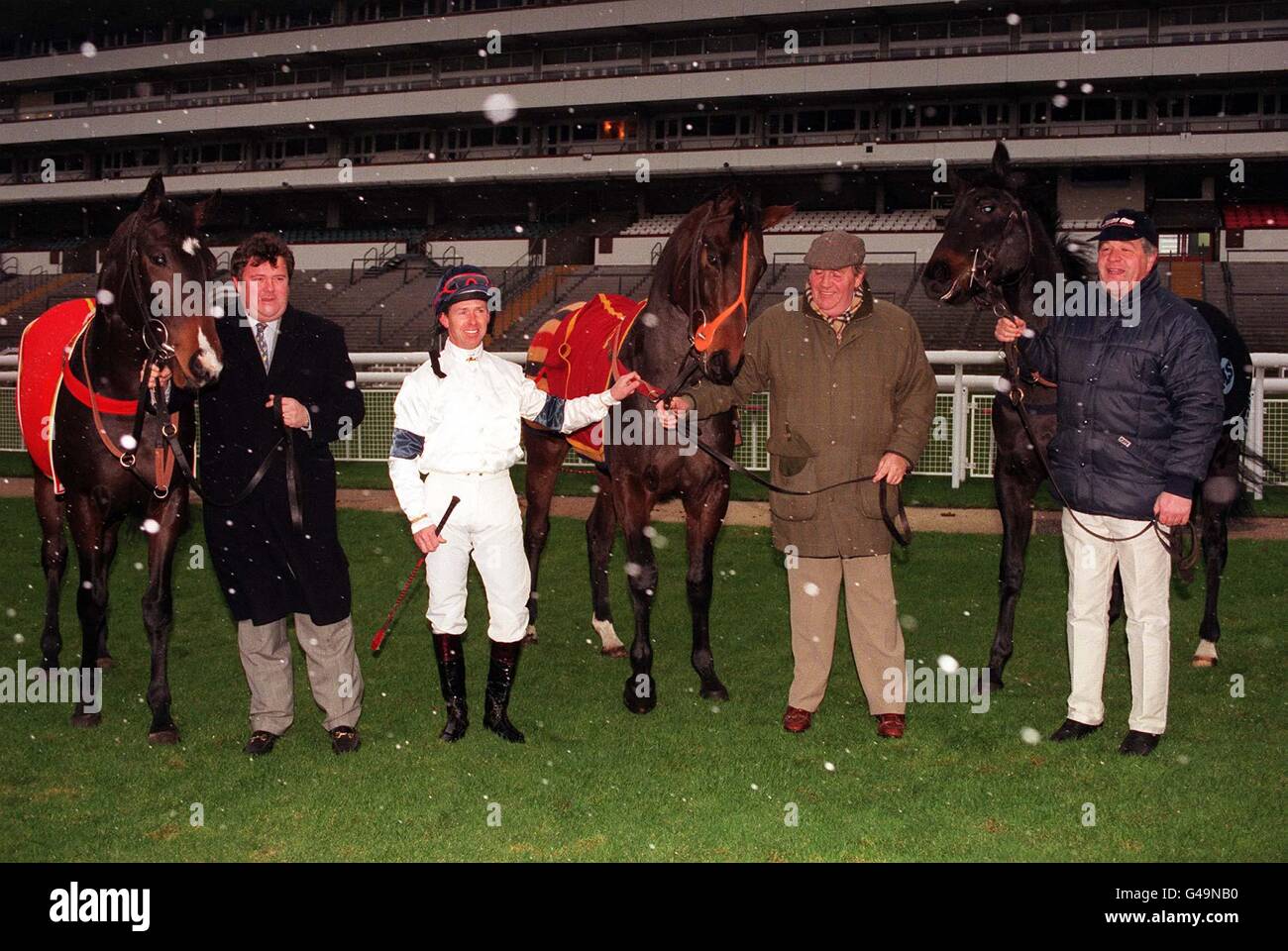 Jockey John Reid and trainers (left to right), Peter Chapple-Hyam ...