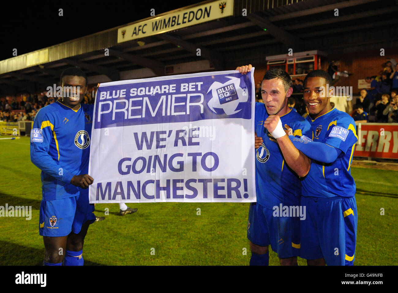 AFC Wimbledon's Ismail Yakubu, Jamie Stuart and James Mulley celebrate ...