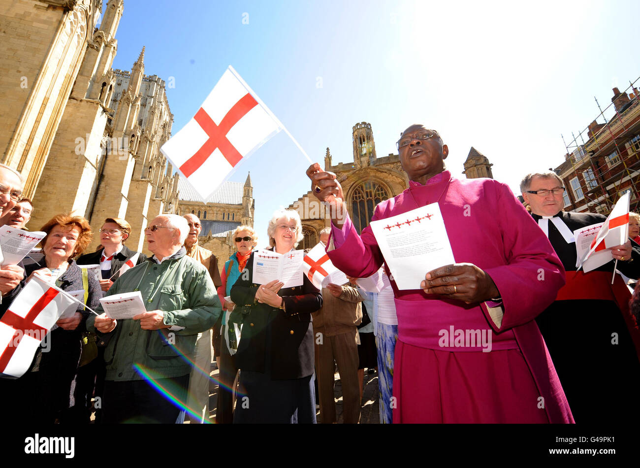 The Archbishop of York Dr John Sentamu leads singers who joined him ...