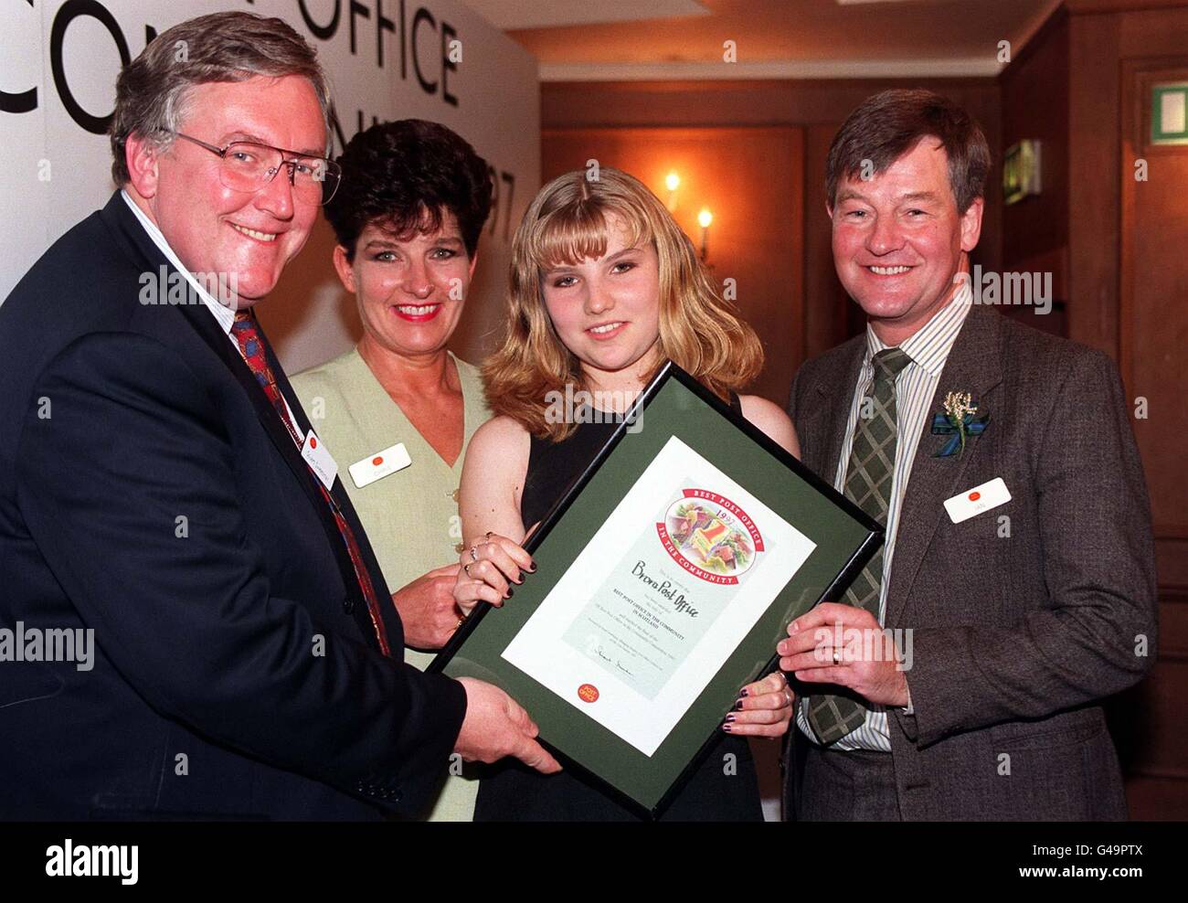 Subpostmaster Ian Terry (right) with wife Christina (2nd left) and ...