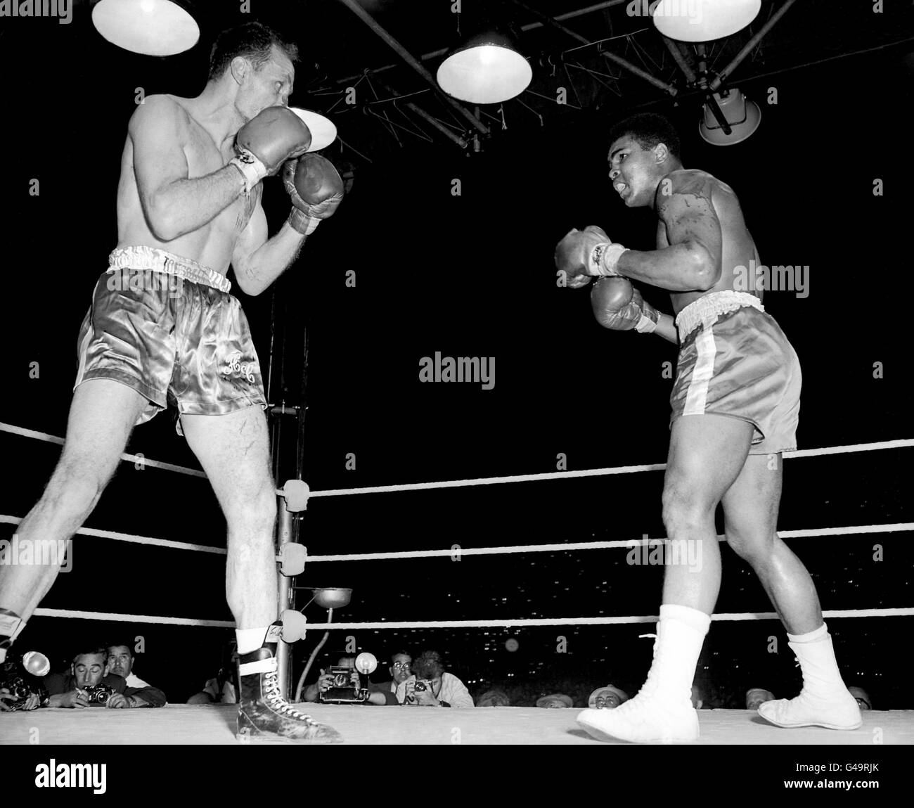 Action during the heavyweight bout between American Cassius Clay and ...
