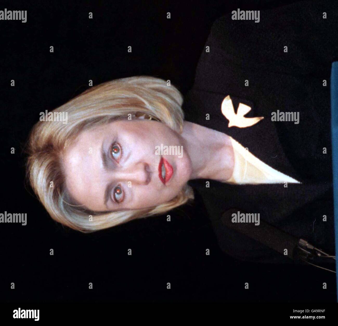 Wife of American President Hillary Clinton wearing a Dove of Peace ...