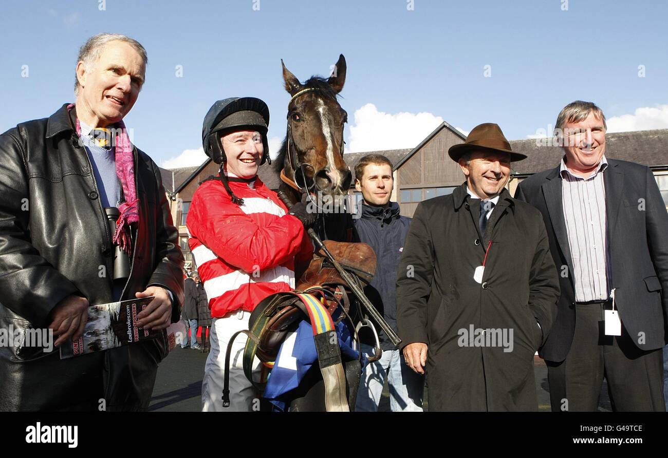 Jockey David Casey (left) poses with the owners of Kerb Appeal after ...