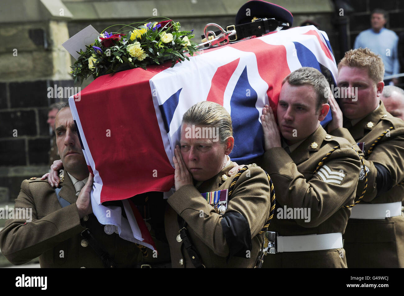 Colleagues from 11 EOD Regiment of the Royal Army Logistic Corps carry ...
