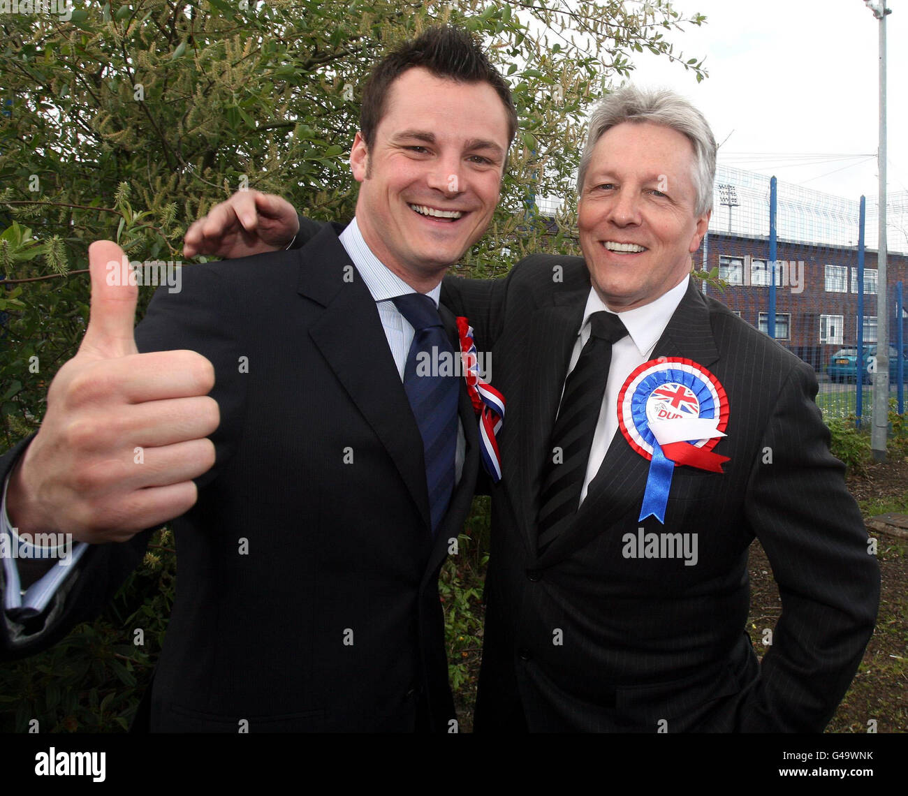 Leader of the DUP Peter Robinson (right) with his son Gareth who has been elected as a ...