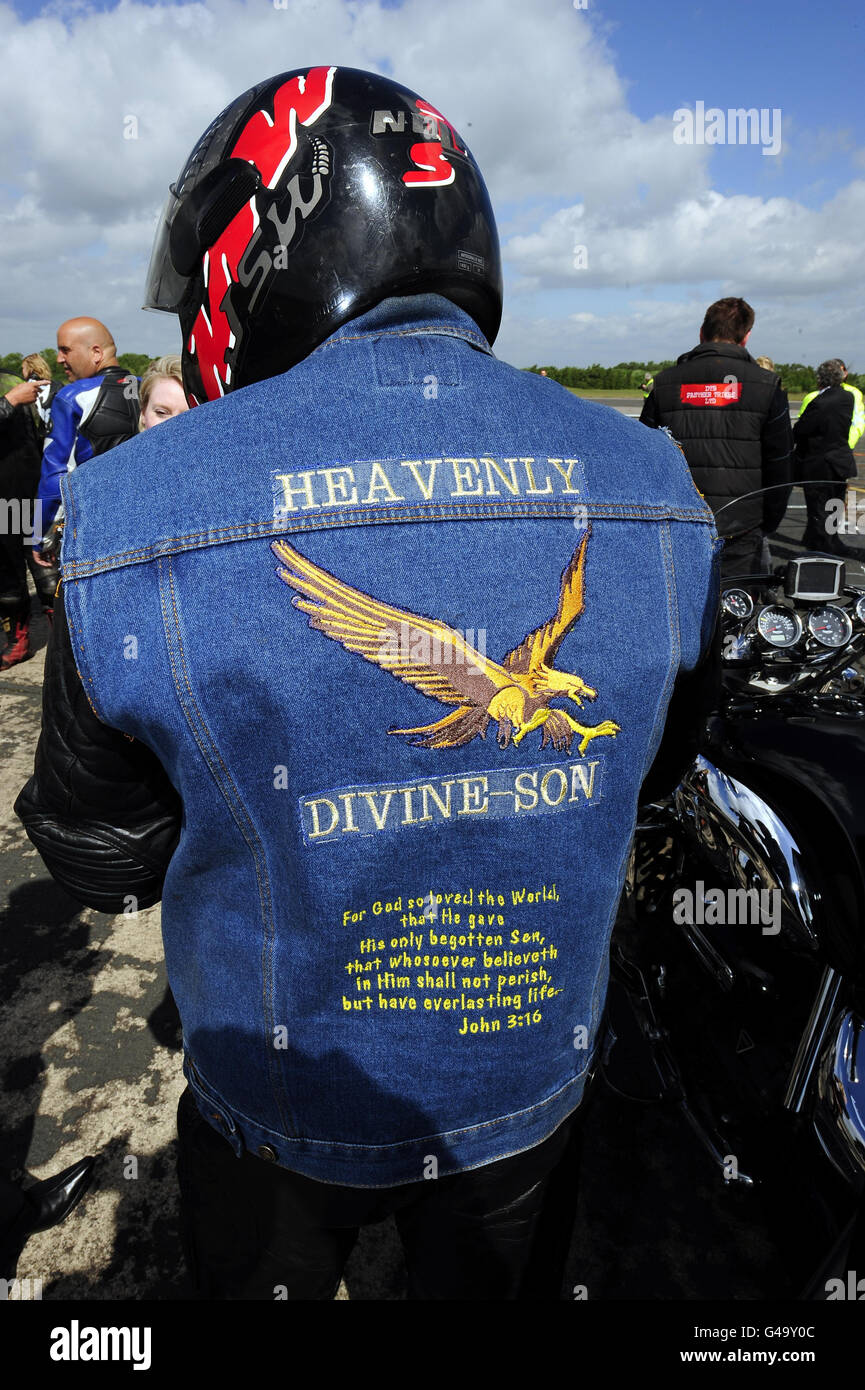 The Reverend Ray Biddiss wearing a personalised jacket after setting a ...