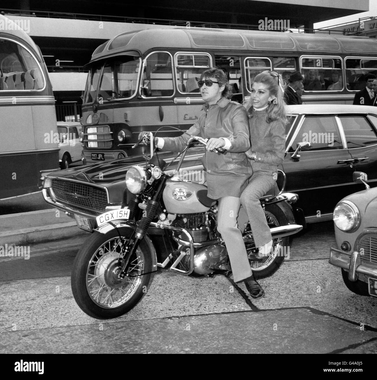 Nancy Sinatra and Mickey Most - Heathrow Airport - London Stock Photo ...