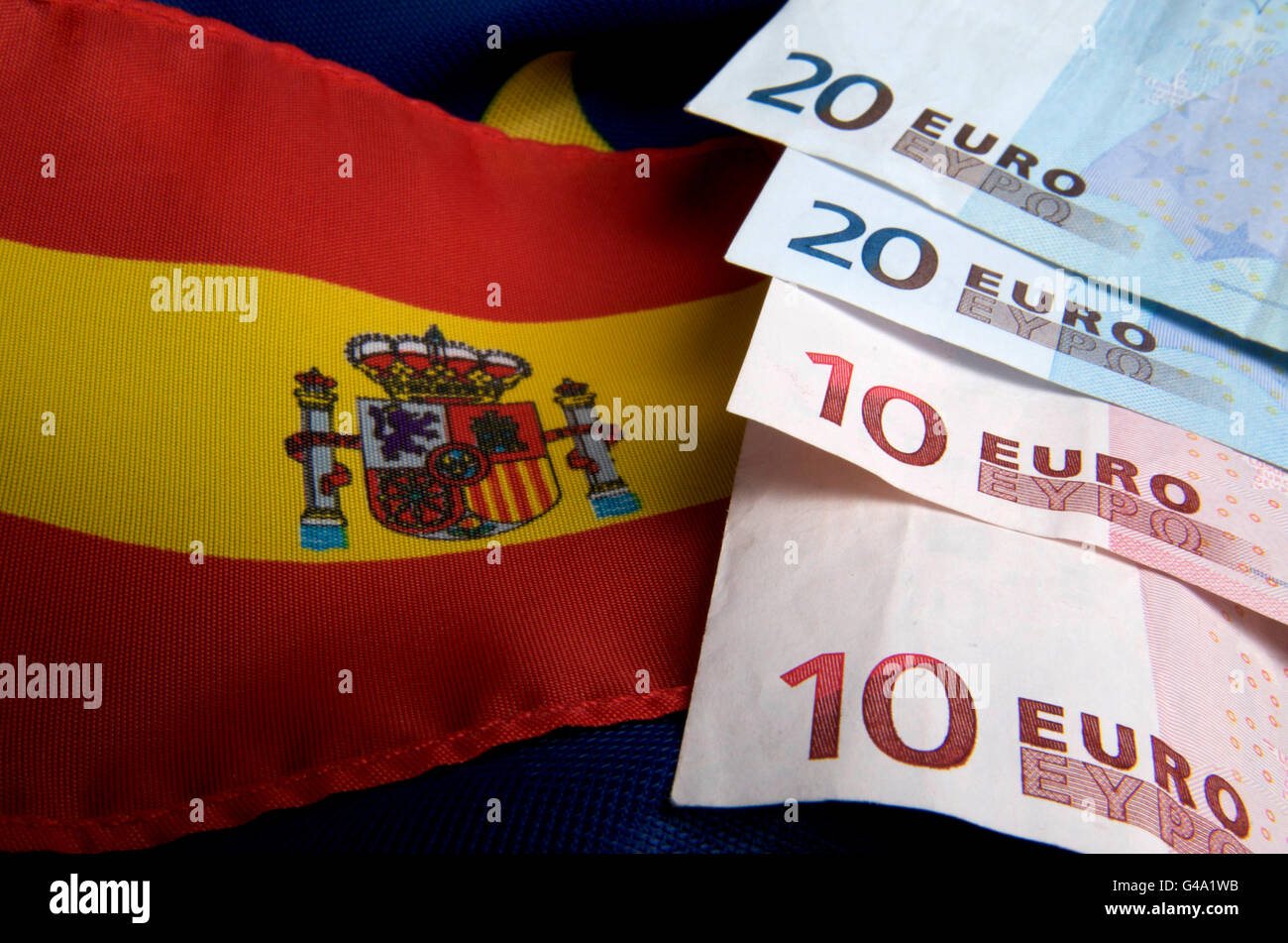 Spanish flag and euro banknotes, illustration Stock Photo - Alamy