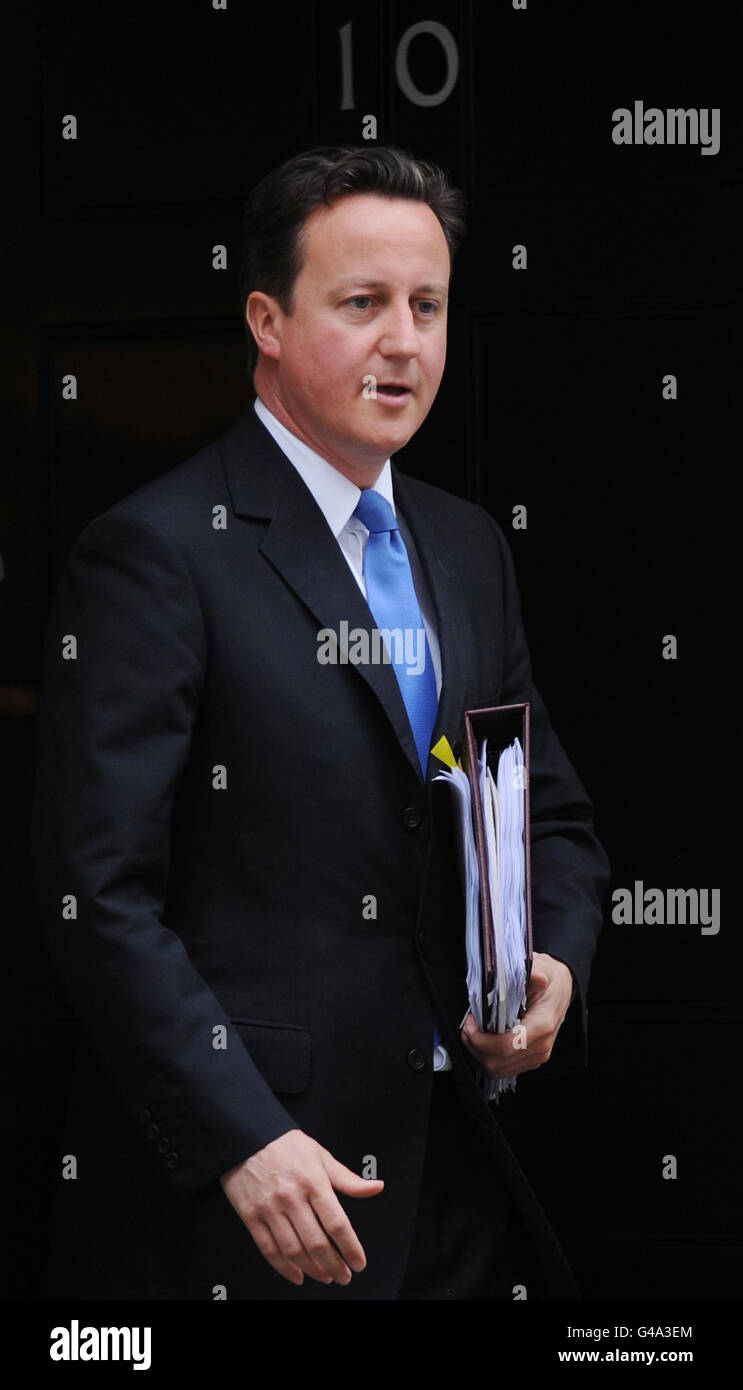 Prime Minister David Cameron leaves 10 Downing Street in London for ...
