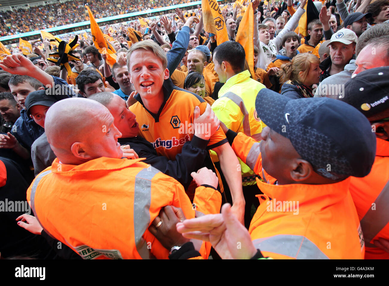 Wolverhampton Wanderers' Christophe Berra is helped off the pitch as ...