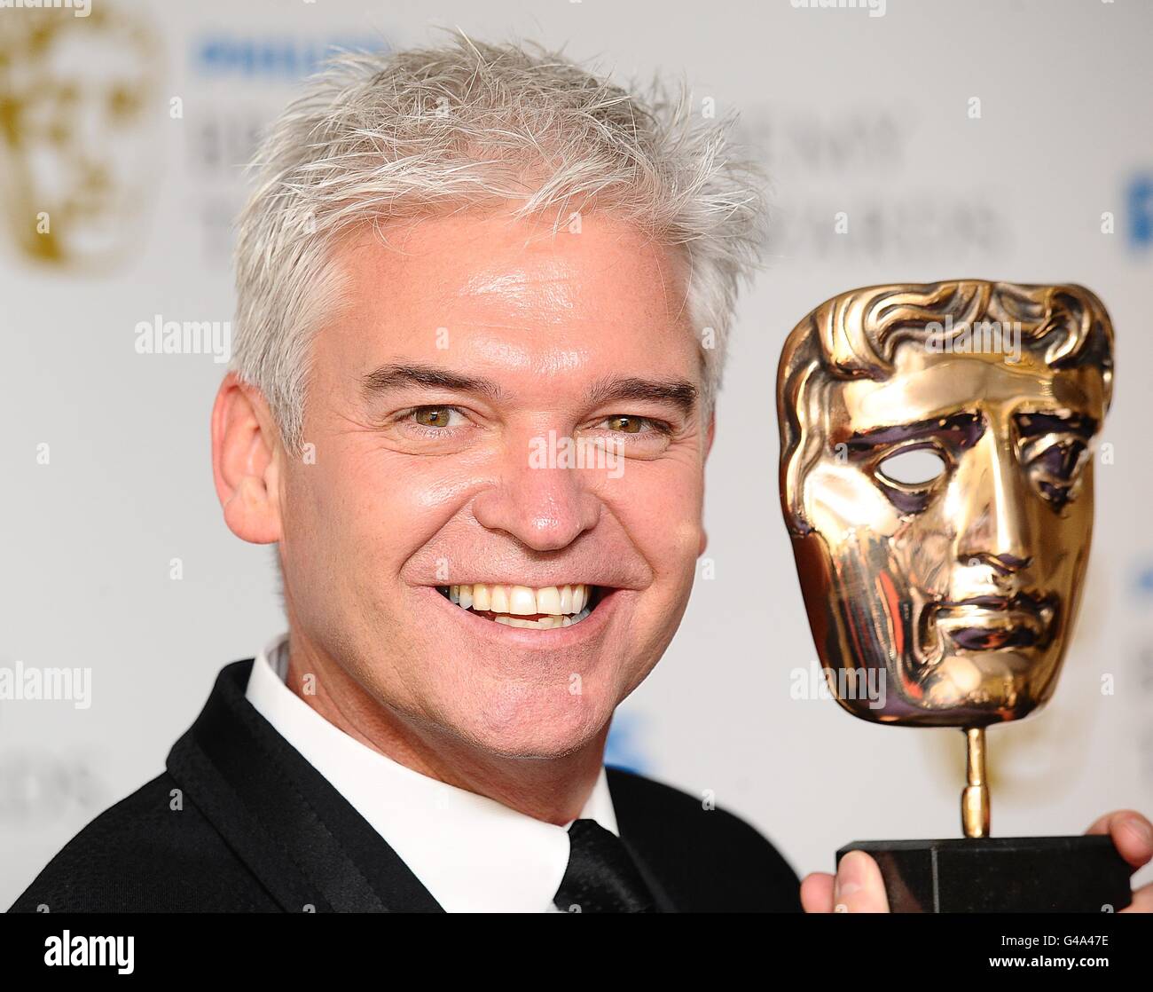 Phillip Schofield with the Entertainment Programme award received for ...