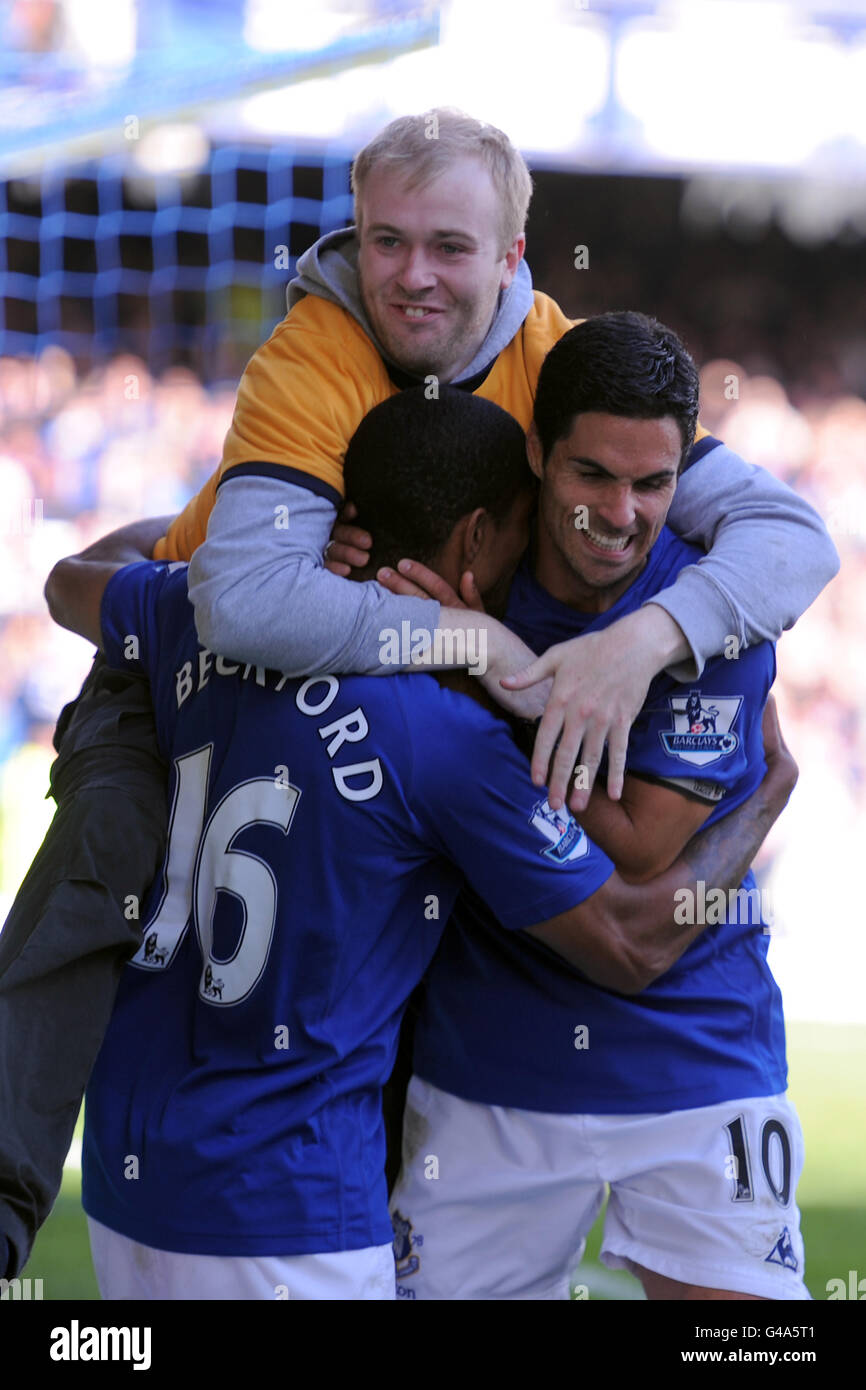 Everton's Jermaine Beckford celebrates with his team-mate Mikel Arteta ...