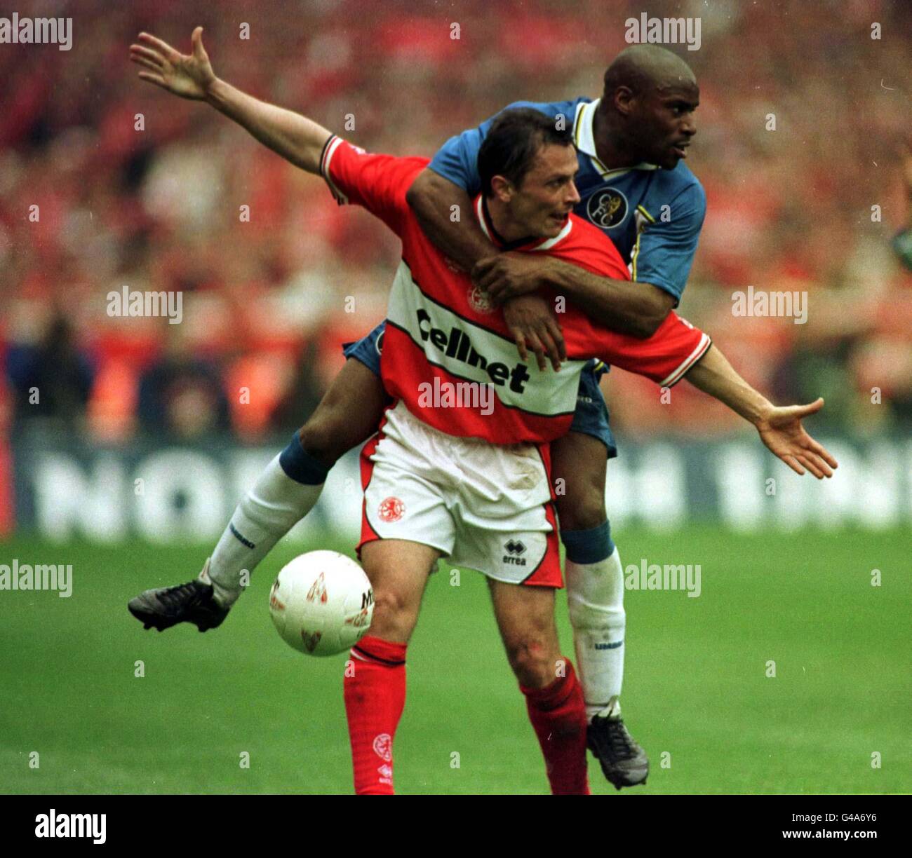 Chelsea's Frank Sinclair jumps on the back of Middlesbrough's Valdimir ...