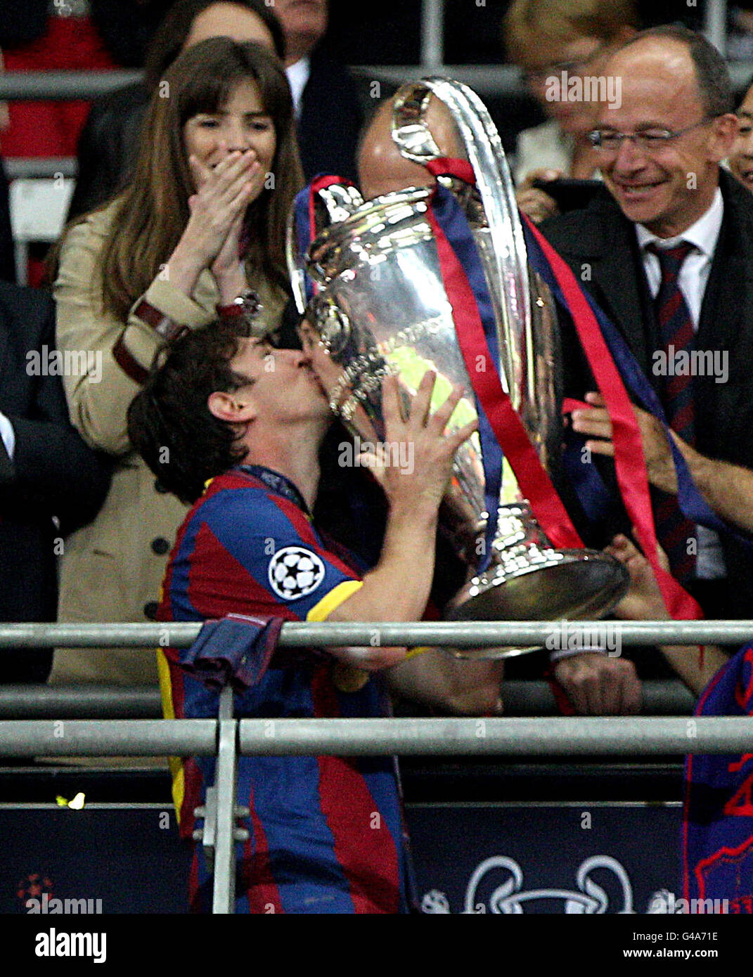Barcelonas lionel messi kisses the uefa champions league trophy hi-res ...