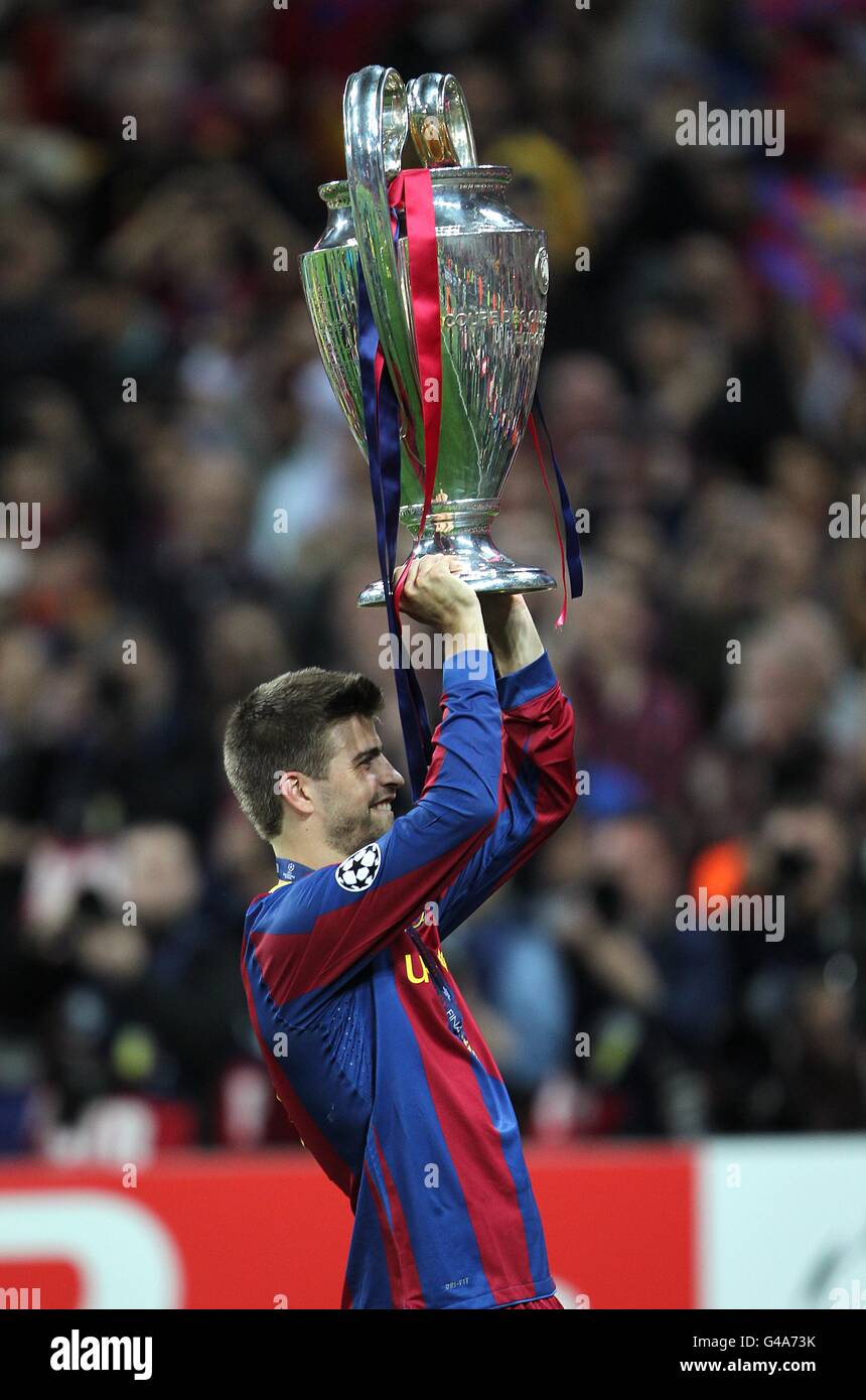 Barcelona's Gerard Pique celebrates with the UEFA Champions League ...