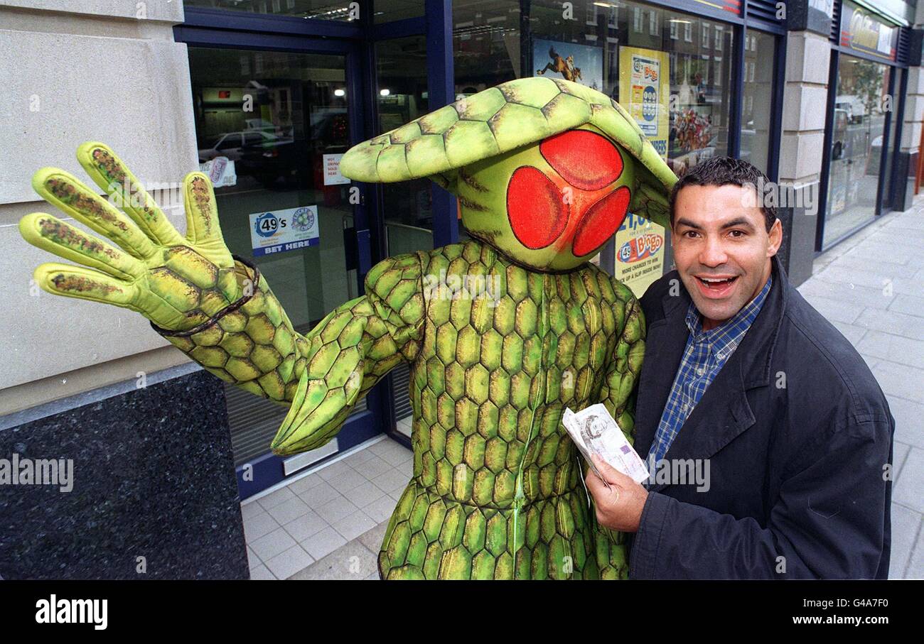 Monster Gamble, Larry Sparks of Eidos with his alien friend place a 200 ...